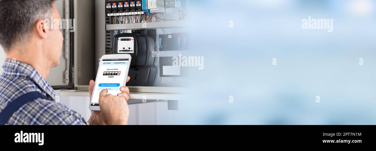 Technician Reading Electric Meter Using Mobile Phone Stock Photo - Alamy Technician Reading Electric Meter Using Mobile Phone Stock Photo - Alamy
