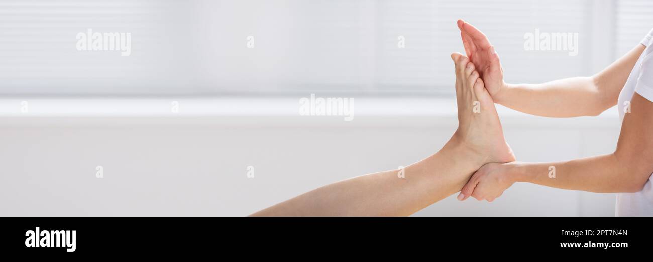Foot Physiotherapist Exercise Massage. Man Rehabilitation Therapy Stock ...