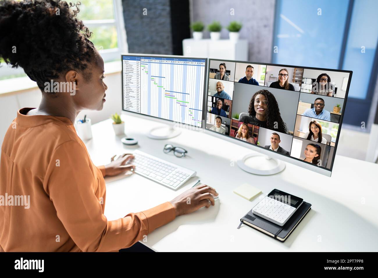 Virtual Conference Agenda On Multiple Computers In Office Stock Photo ...