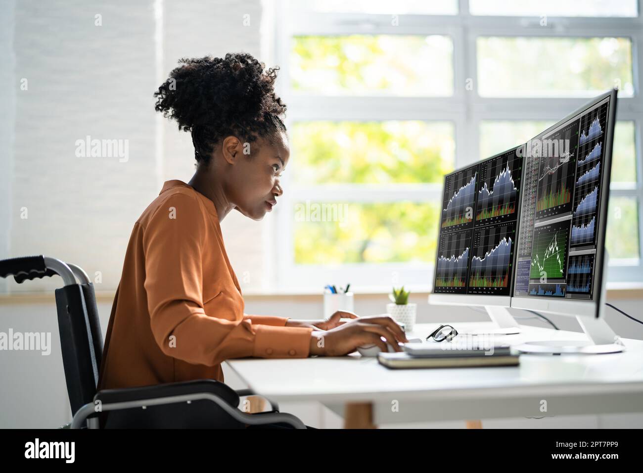 Stock Market Analyst At Office Desk Using Multiple Screens Stock Photo ...