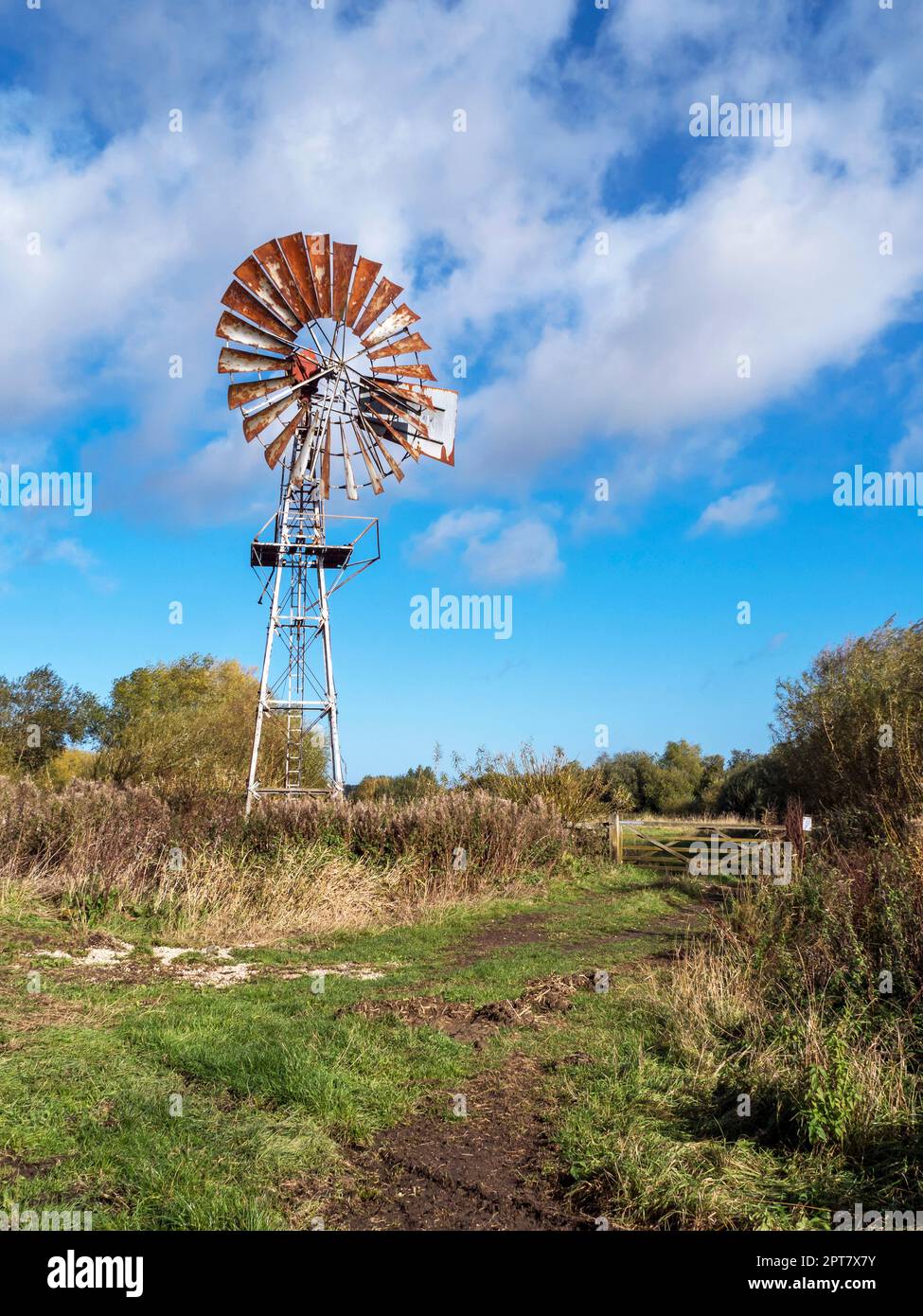 Rusty old wind pump at Wheldrake Ings Nature Reserve in North Yorkshire ...