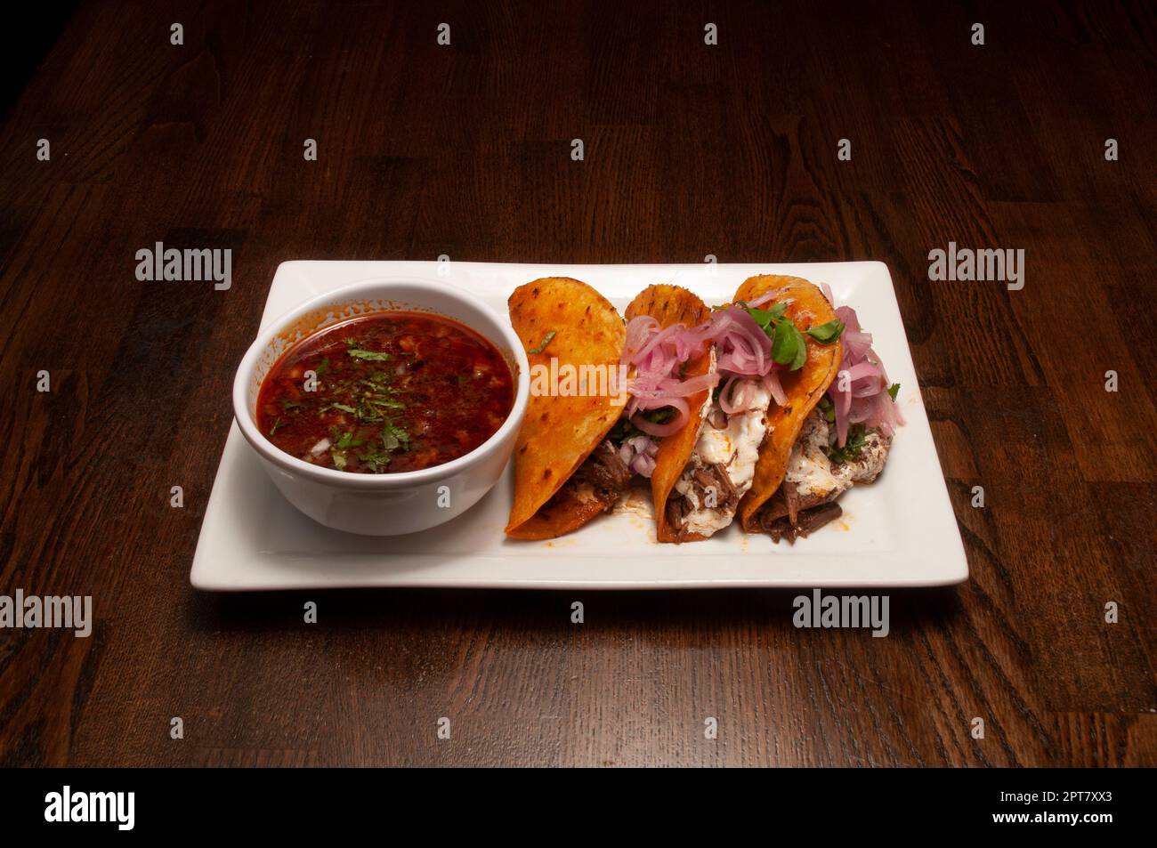 Traditional mexican delicacy known as a quesabirria Stock Photo - Alamy