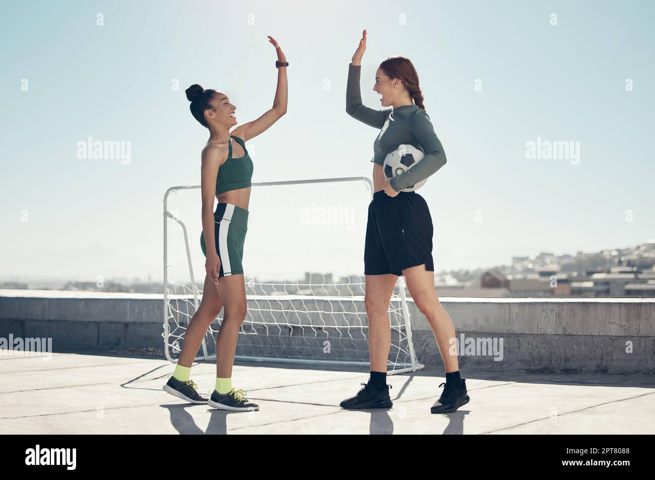 Athlete high five soccer hi-res stock photography and images - Alamy