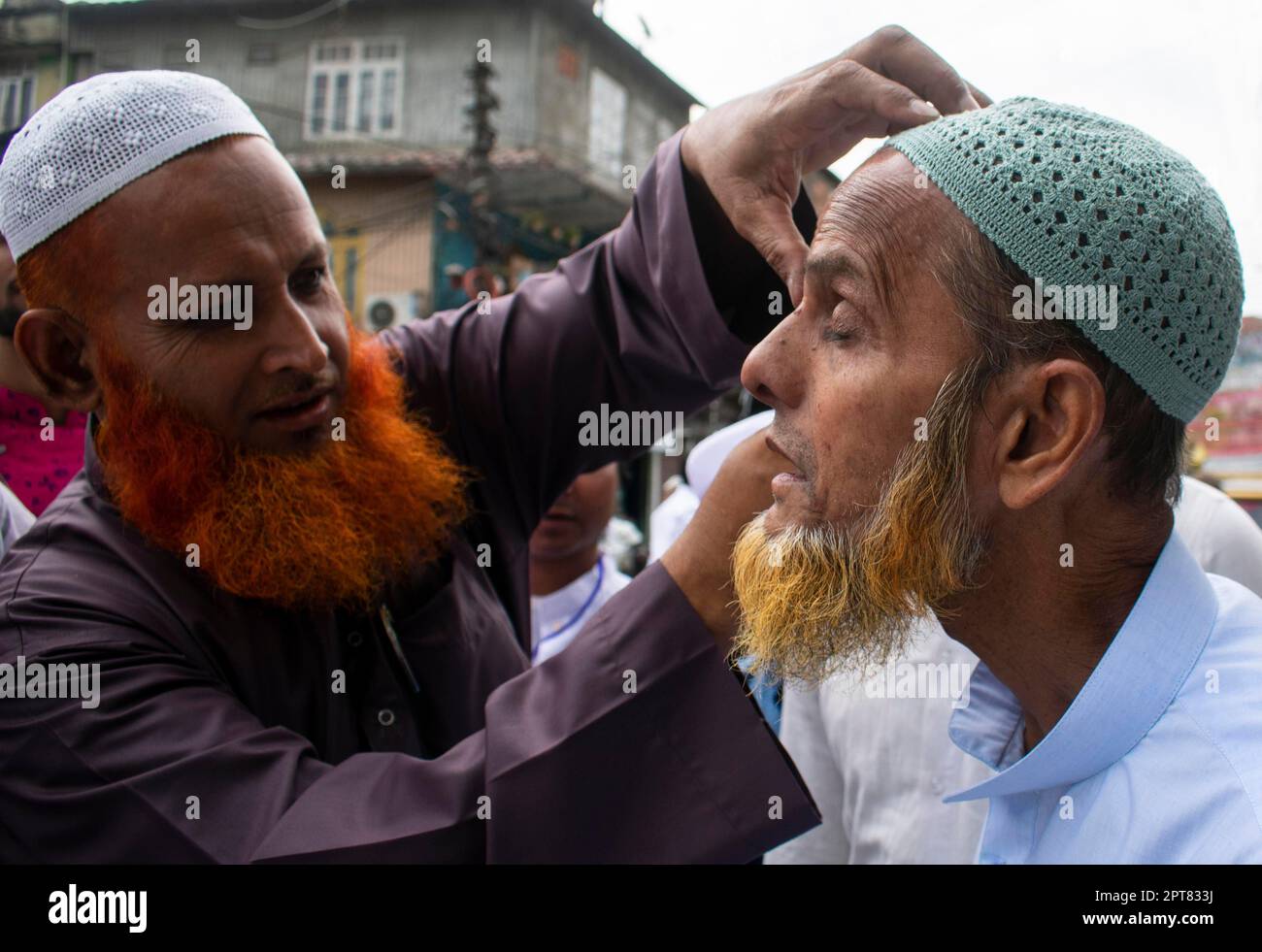 Guwahati, India. 22 April 2023. A Muslim man applies Surma on eyes ...