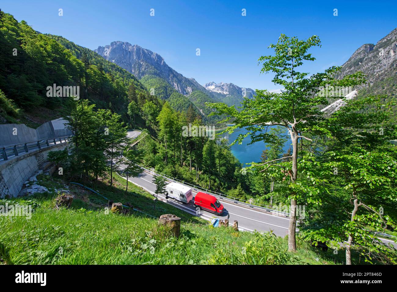 Motorhome, caravan on the pass road from Slovenia to Lago del Predil ...