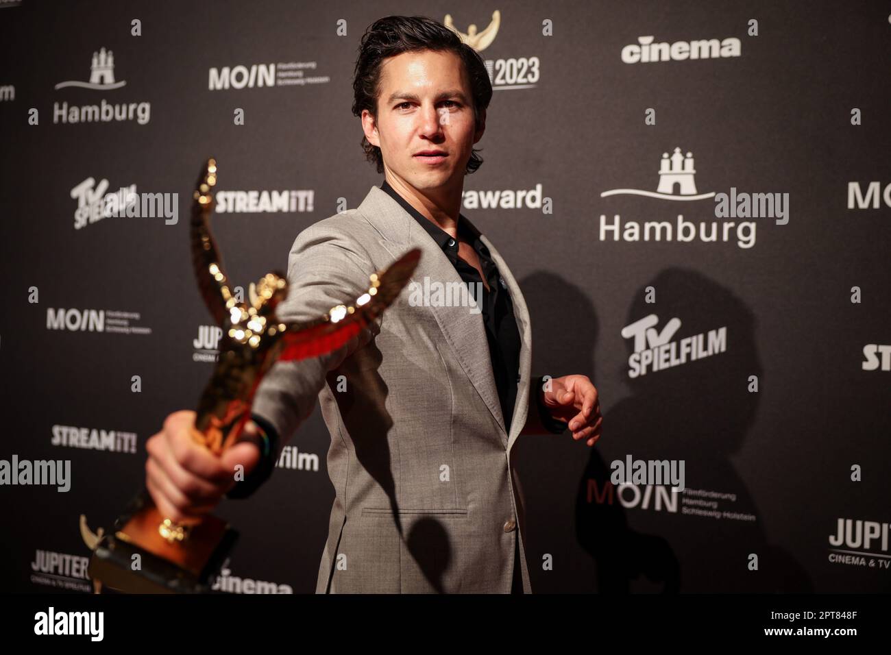 Hamburg, Germany. 27th Apr, 2023. Tim Oliver Schultz, actor, celebrates ...