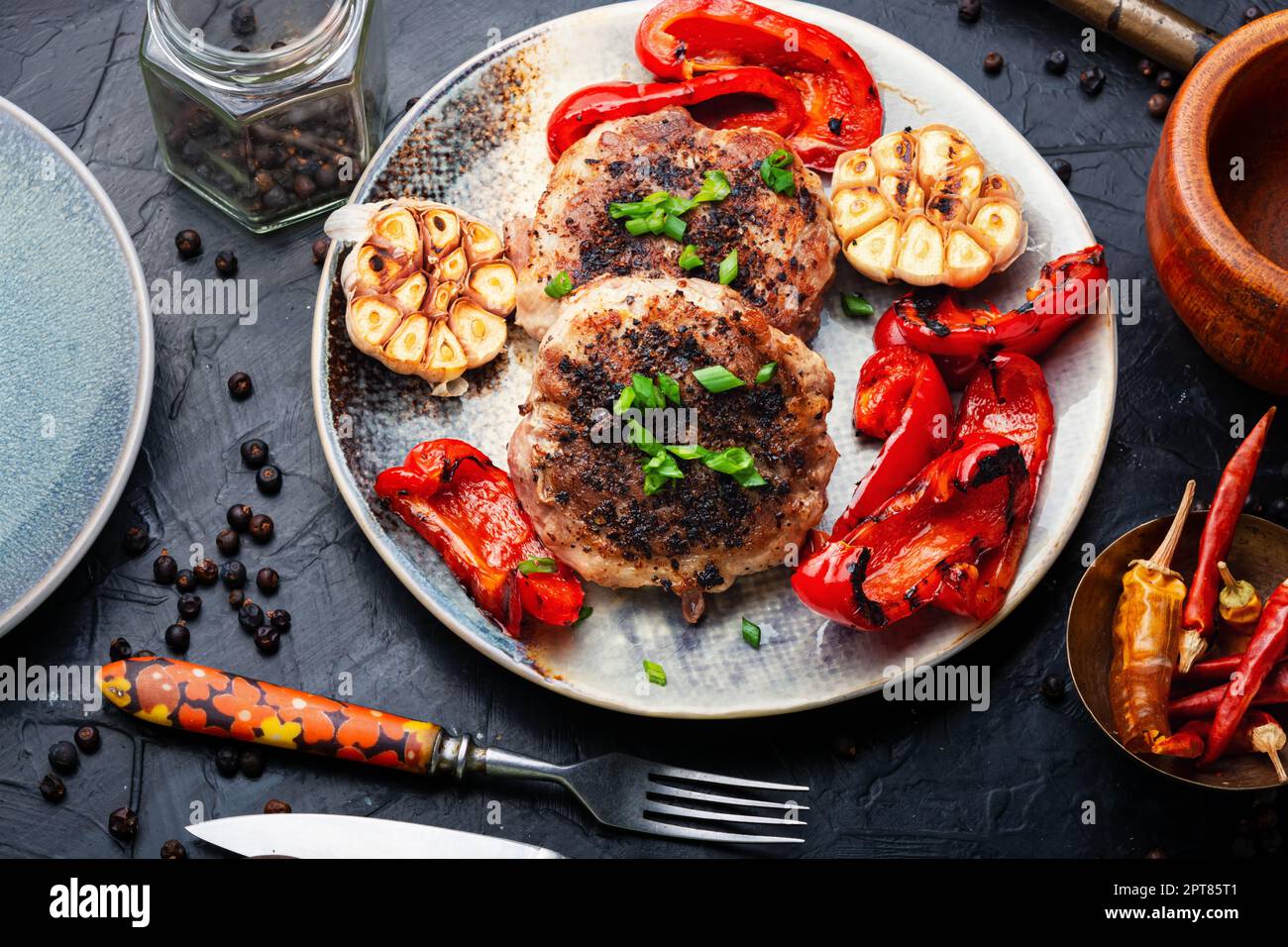 Beefsteak, beef and pork marinated in juniper berries Stock Photo - Alamy