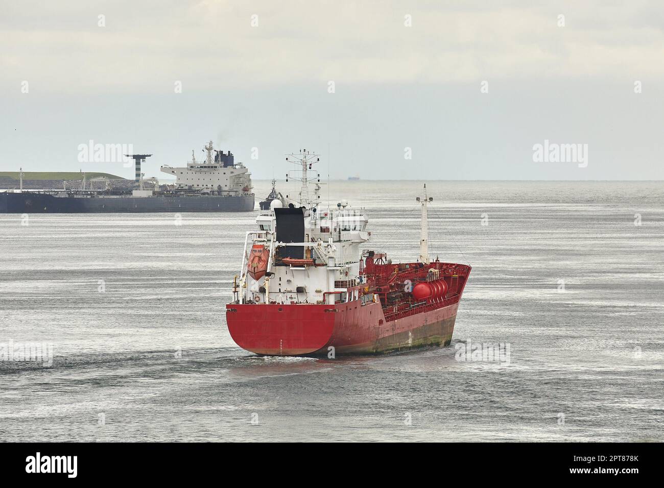 Industrial tanker ship at the entrance of the Port of Rotterdam Stock ...