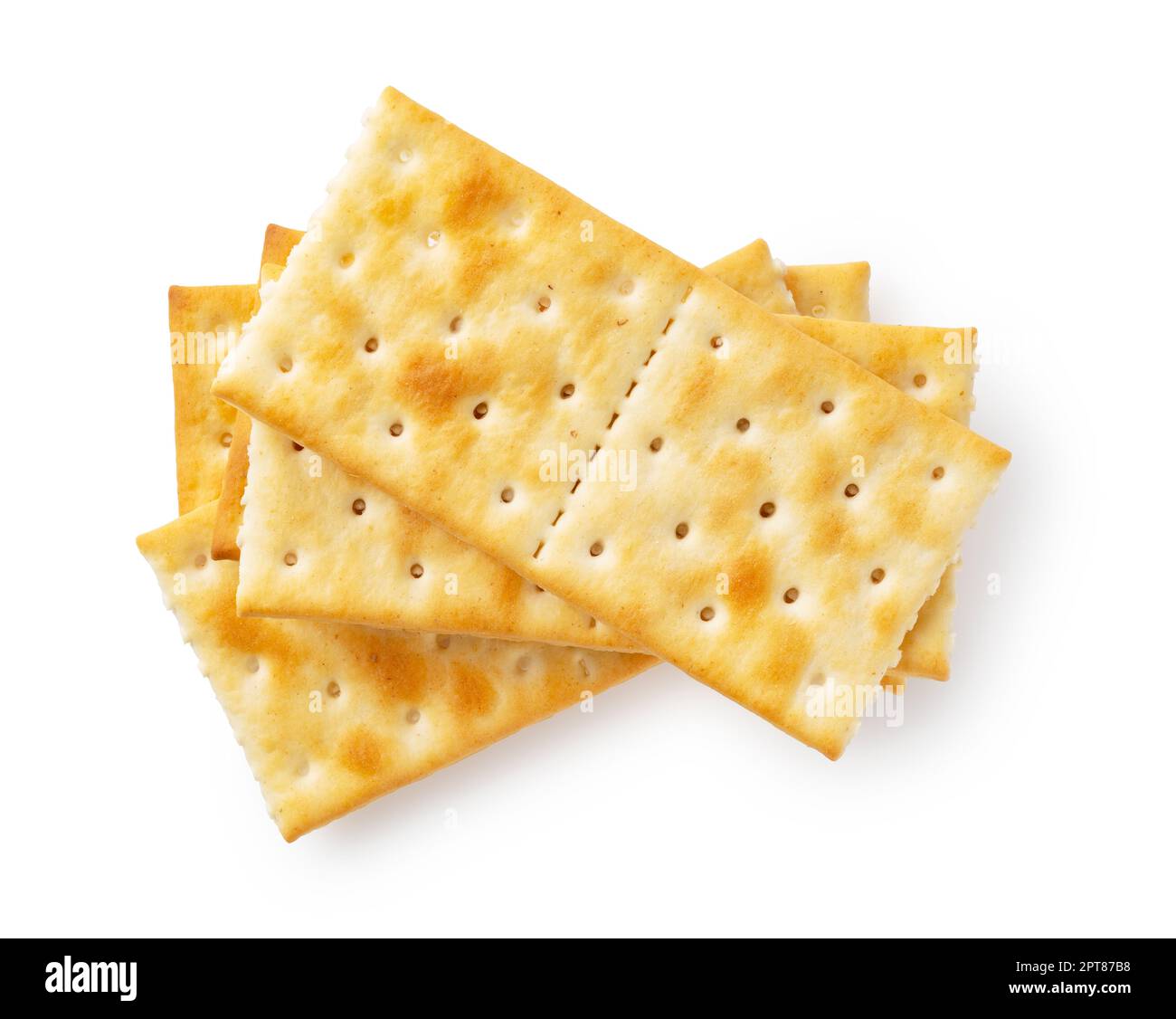 Crackers placed on top of each other on a white background. Viewed from ...