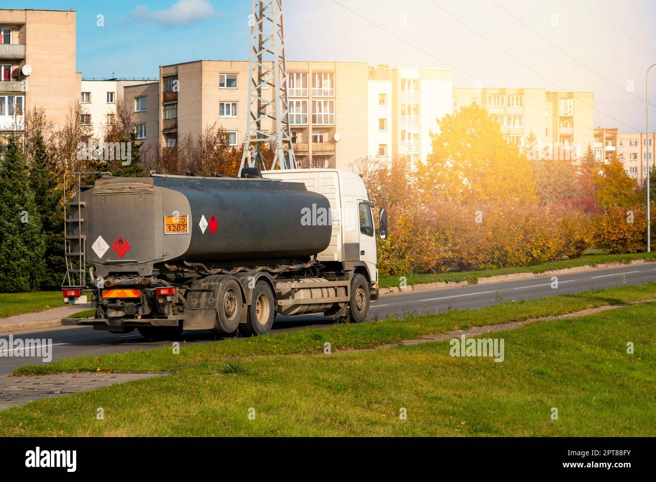 Heavy transport on the city street. Hazardous and flammable goods on a ...