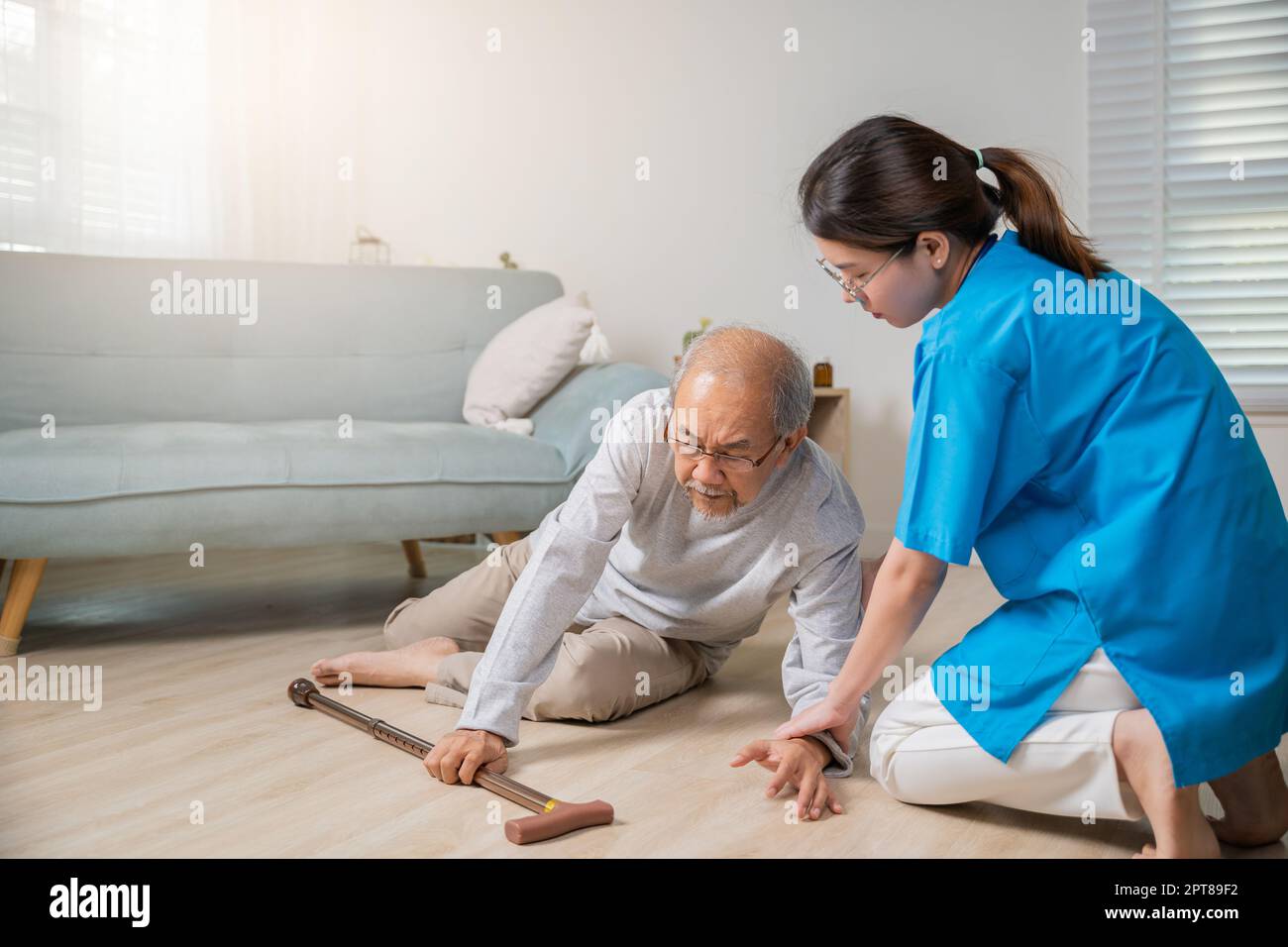 Disabled elderly man patient with walking stick fall on ground and ...