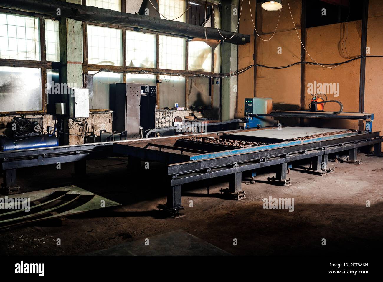 interior of a machine hall at an old industrial factory Stock Photo - Alamy