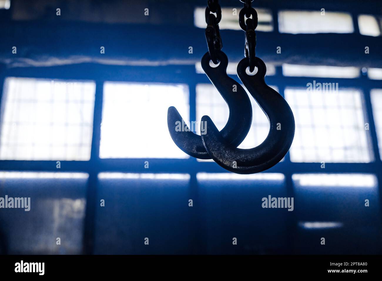 steel chain hook of electric hoist. industrial background. Crane cargo ...