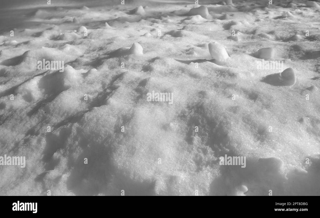 Snow texture, snowdrifts under sunlight with shadows Stock Photo - Alamy