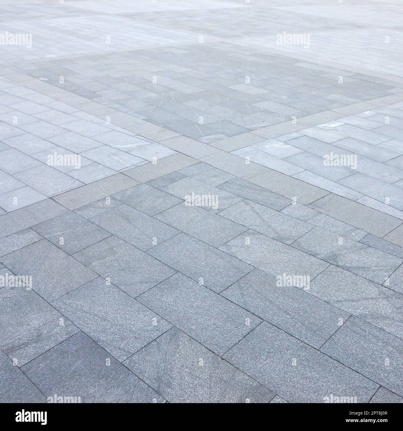 Fragment of the square paved of a large granite tiles Stock Photo - Alamy