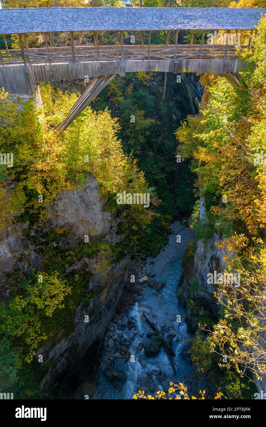 Old wooden bridge, Teufelsbruecke, with shingle-covered wooden roof ...