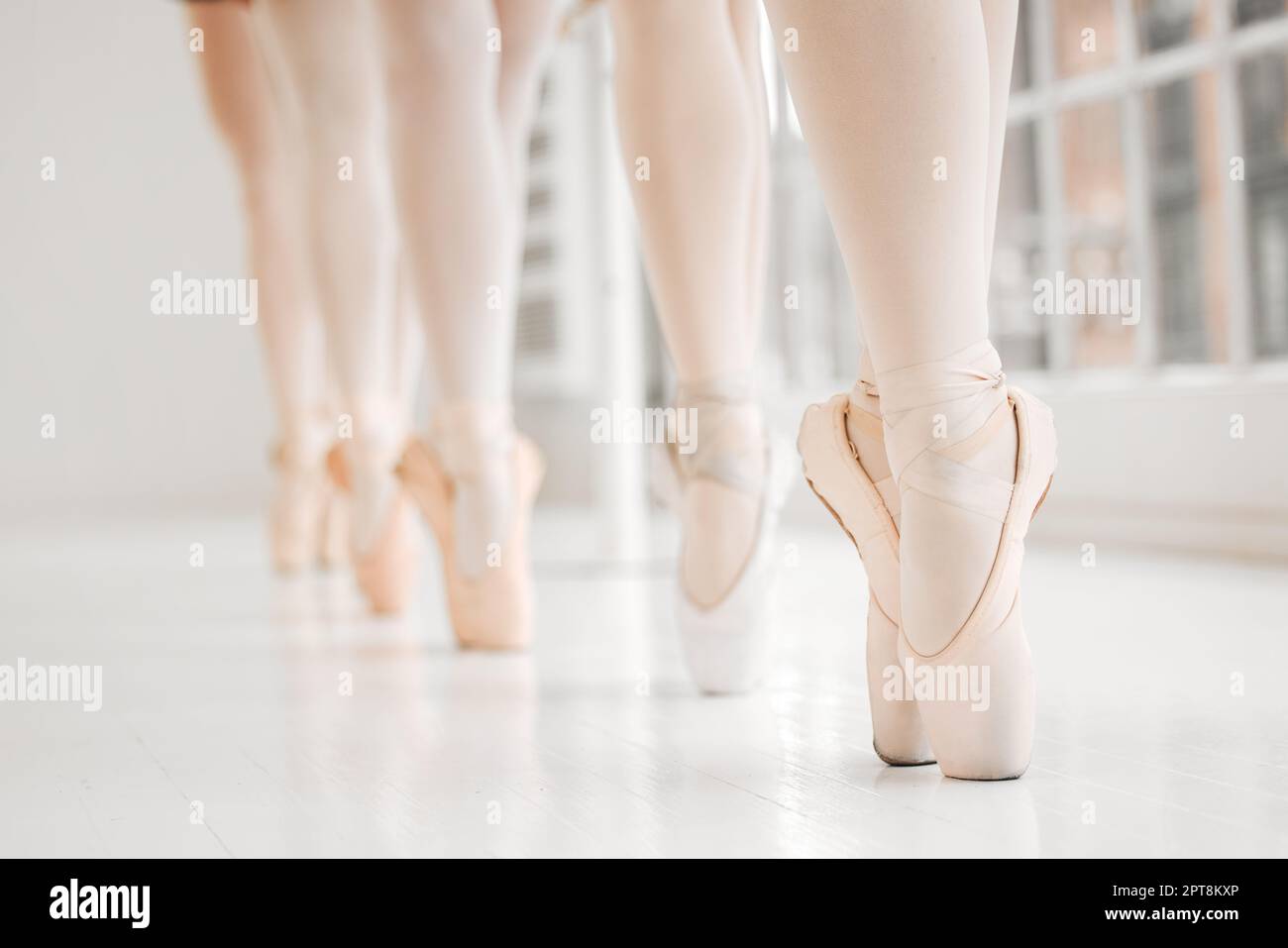 A subtle kiss that no one sees. a group of ballet dancers during their ...