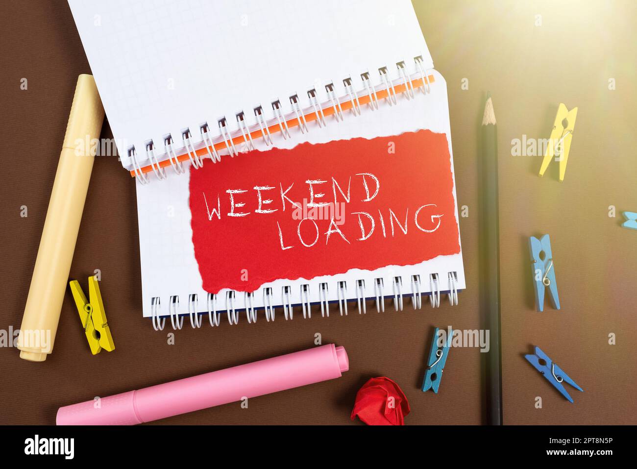 Sign displaying Weekend Loading, Word Written on Starting Friday party ...