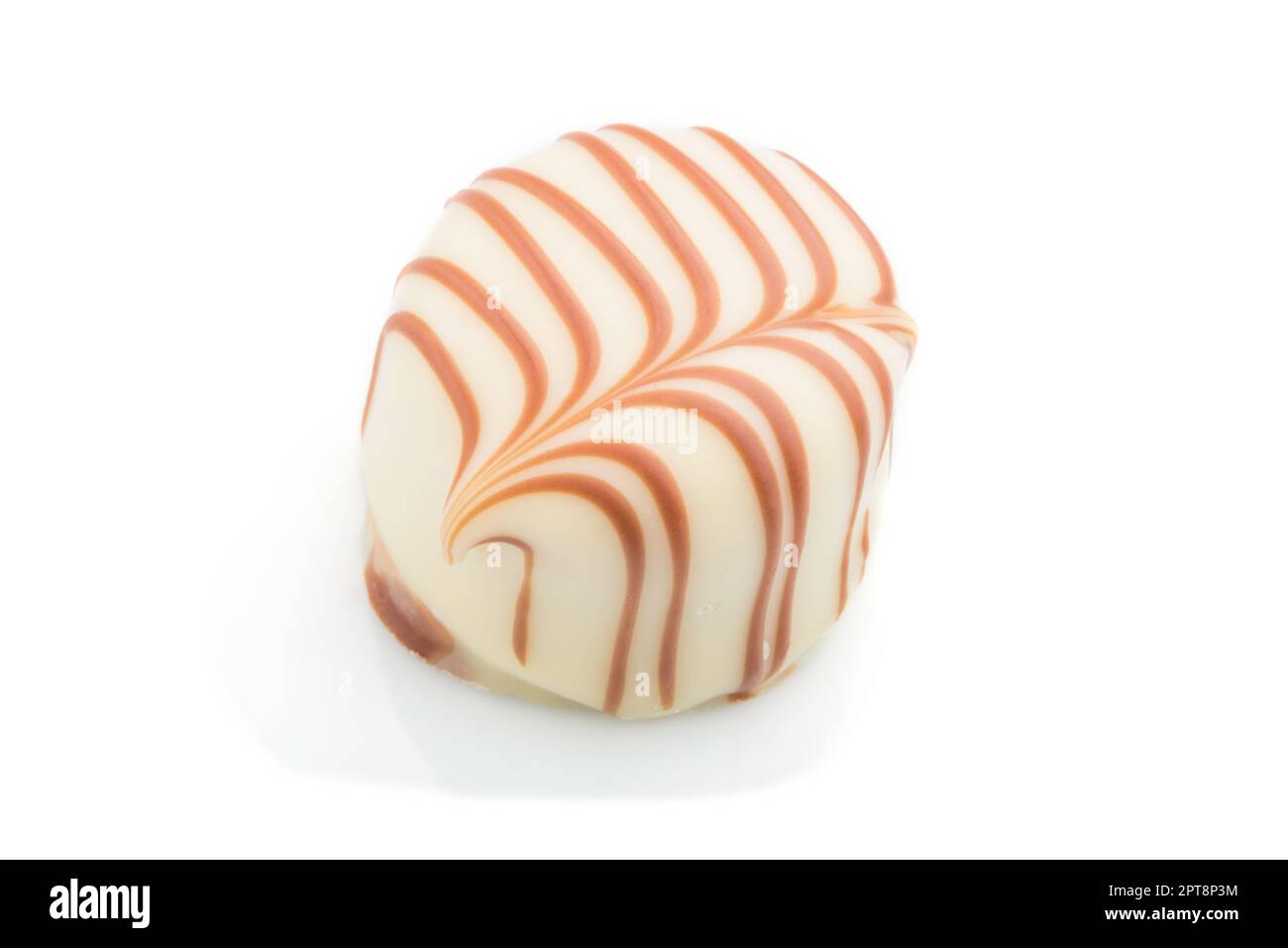 Single chocolate candy isolated on white background. side view, close ...