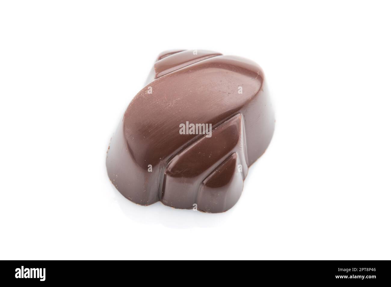 Single chocolate candy isolated on white background. side view, close ...