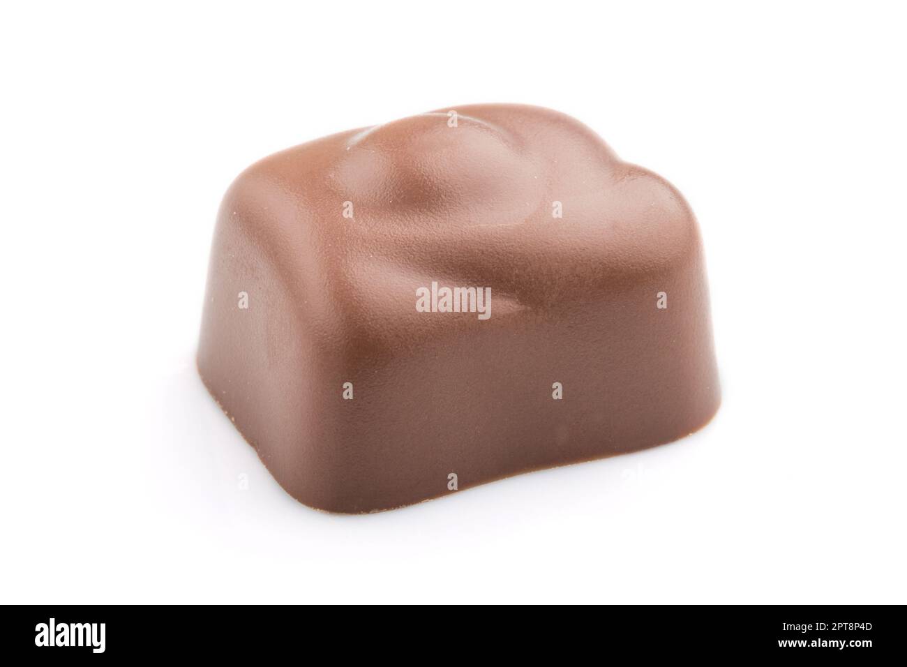 Single chocolate candy isolated on white background. side view, close ...