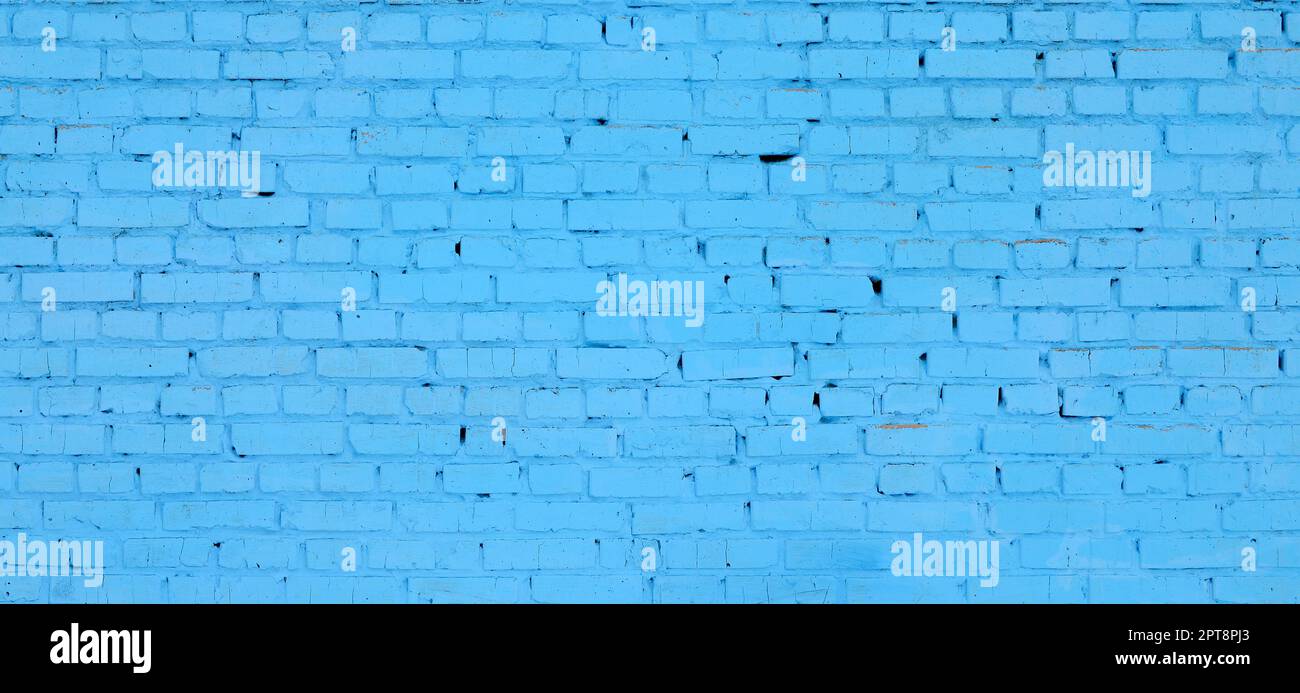 Square brick block wall background and texture. Painted in blue Stock ...