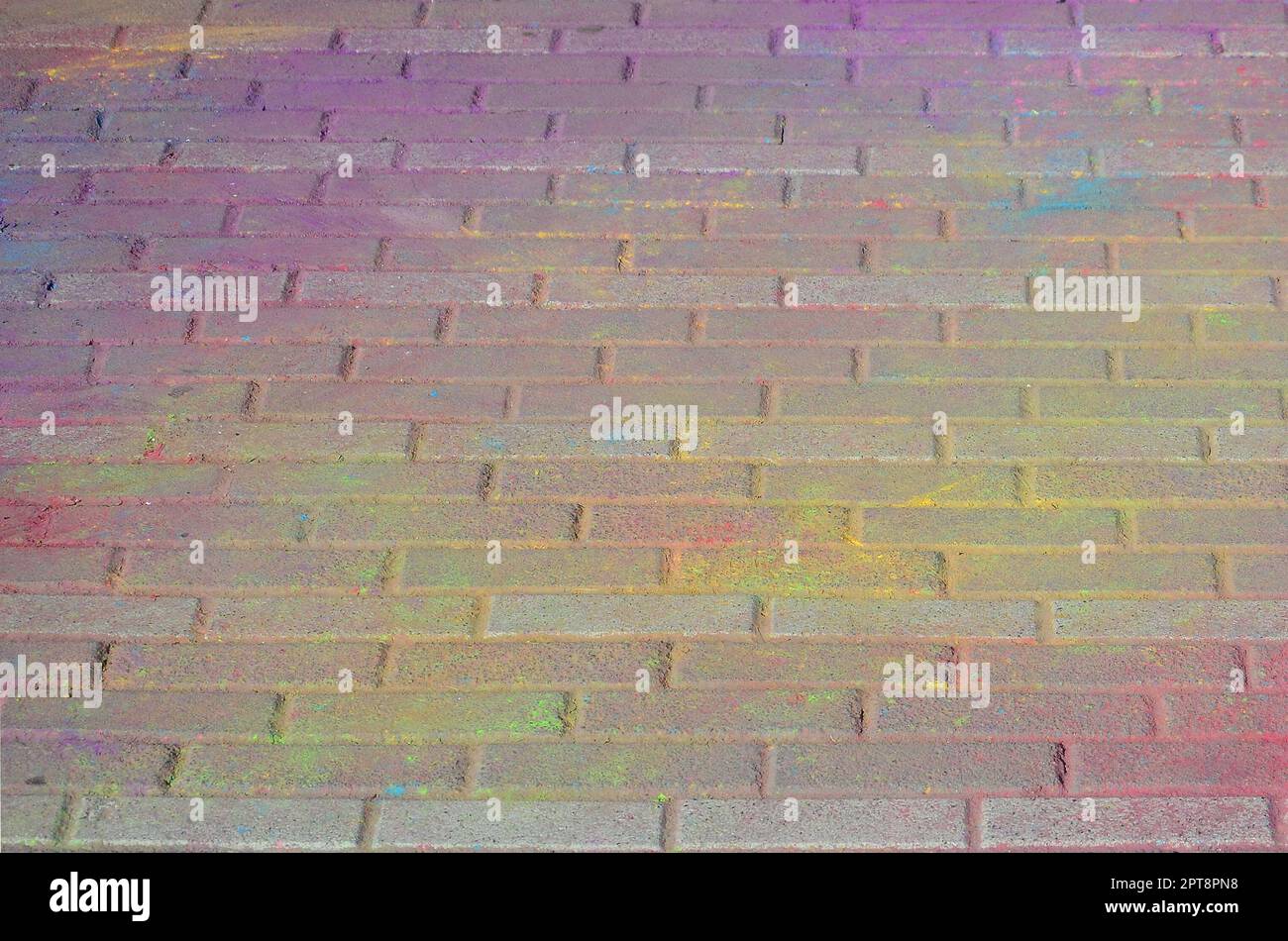 Multi colored earth, paving slabs, powder coated with dry colors at the ...
