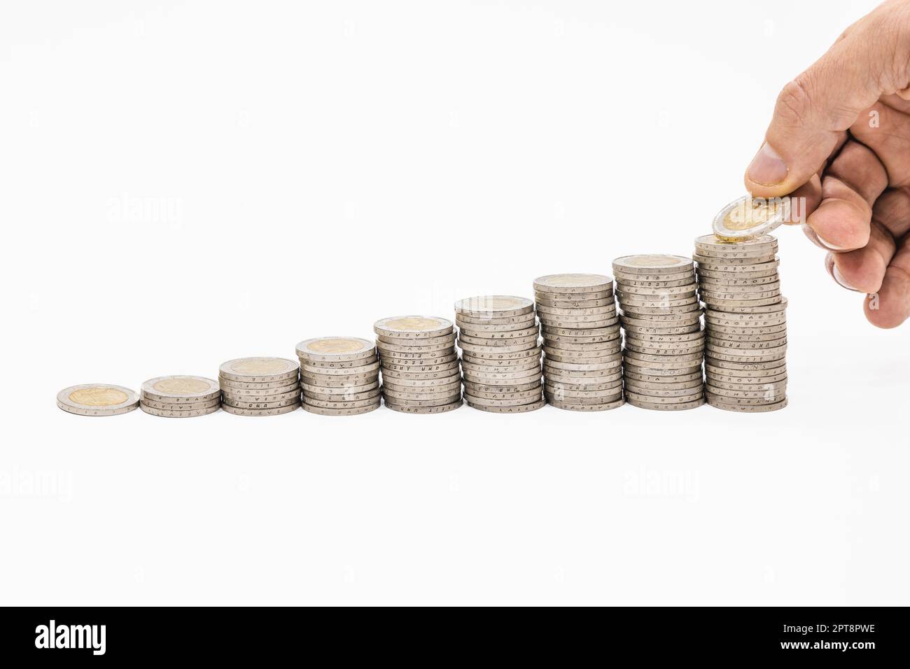 Hand put coins into the stack of coins. Business and financial growth ...