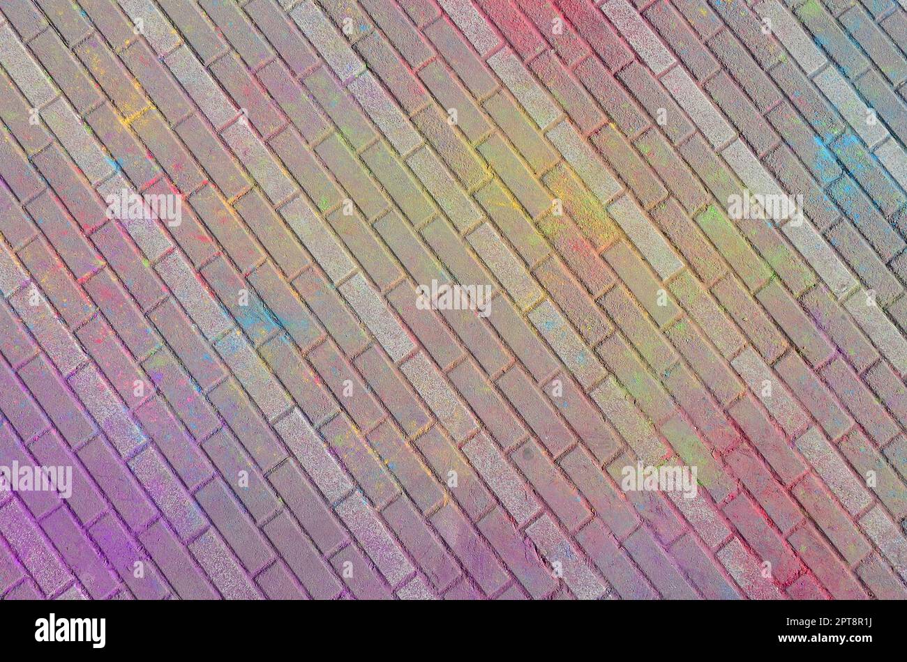 Multi colored earth, paving slabs, powder coated with dry colors at the ...