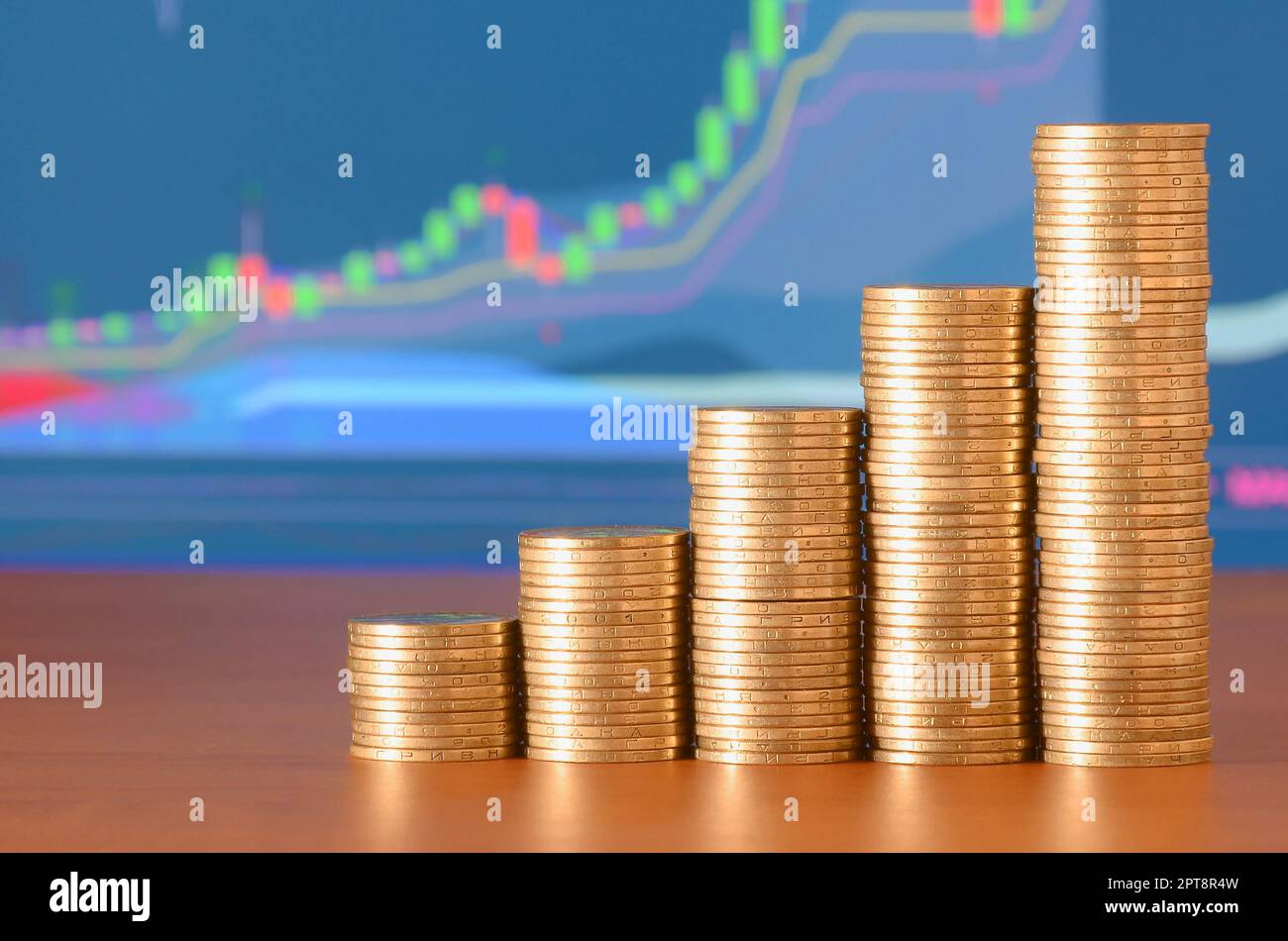 Golden coin stacks arranged as a graph. Increasing columns of coins ...