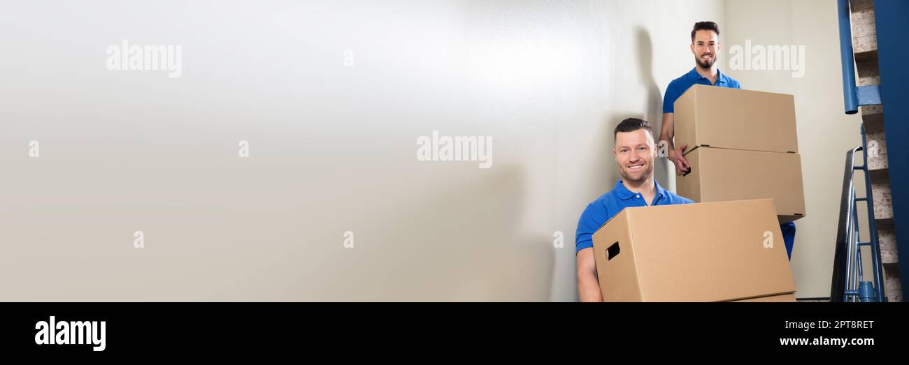 Man carrying boxes down stairs hi-res stock photography and images - Alamy
