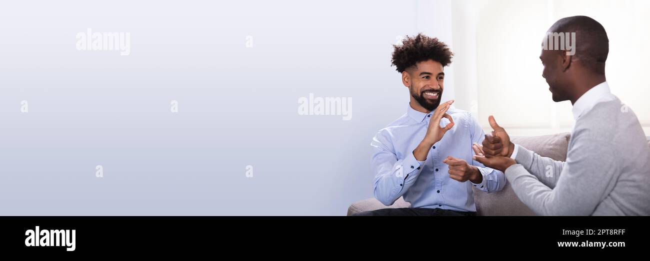 Deaf Impaired Sign Language. Two People Talking Stock Photo - Alamy