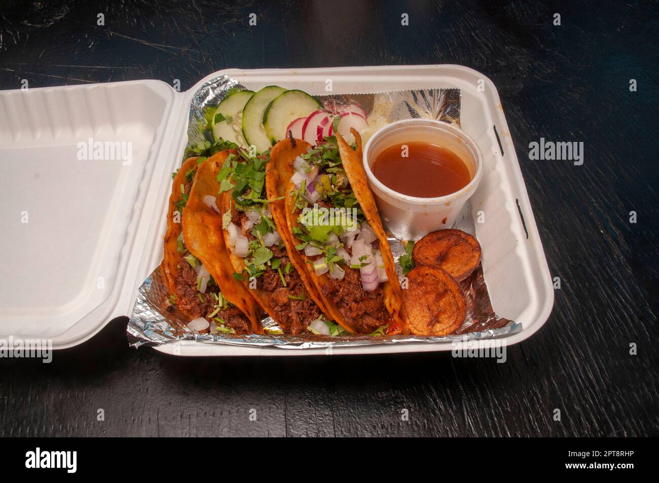 Authentic tex mex mexican cuisine known as a Red Taco Stock Photo - Alamy