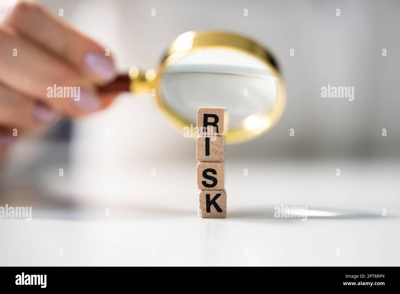 Risk Detection Using Magnifying Glass. Wooded Block Word Stock Photo ...
