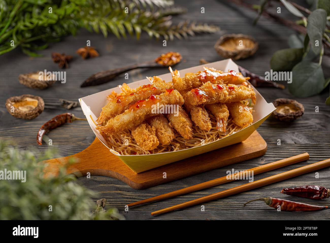 Crunchy bread crumbs coating fried shrimps with noodles Stock Photo - Alamy