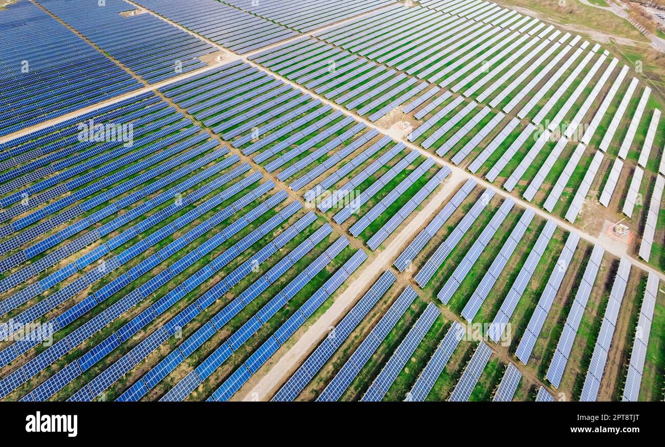 Concept of sustainable energy solution. Frameless solar panels, battery ...