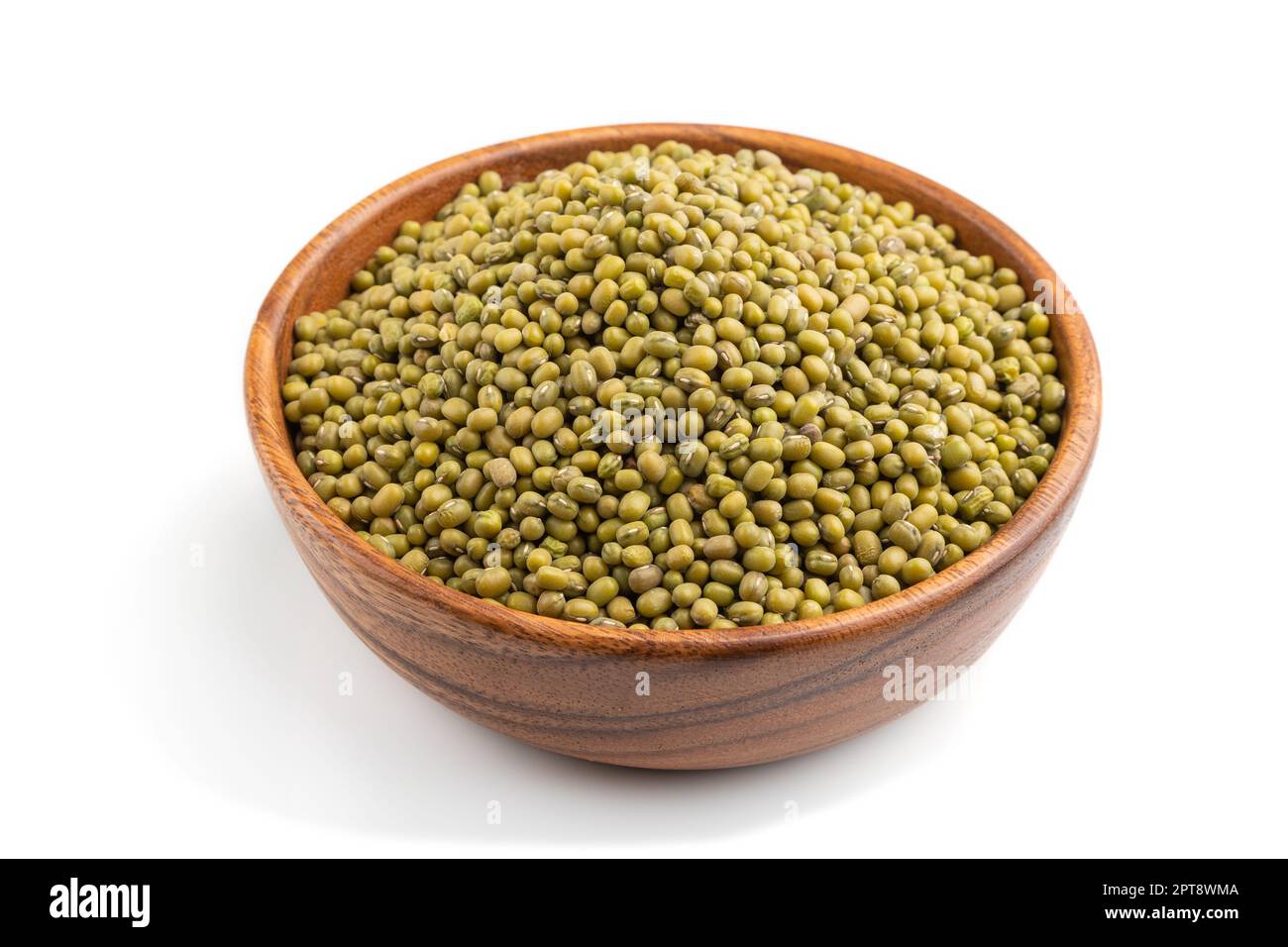 Wooden bowl with raw green mung bean isolated on white background. Side ...