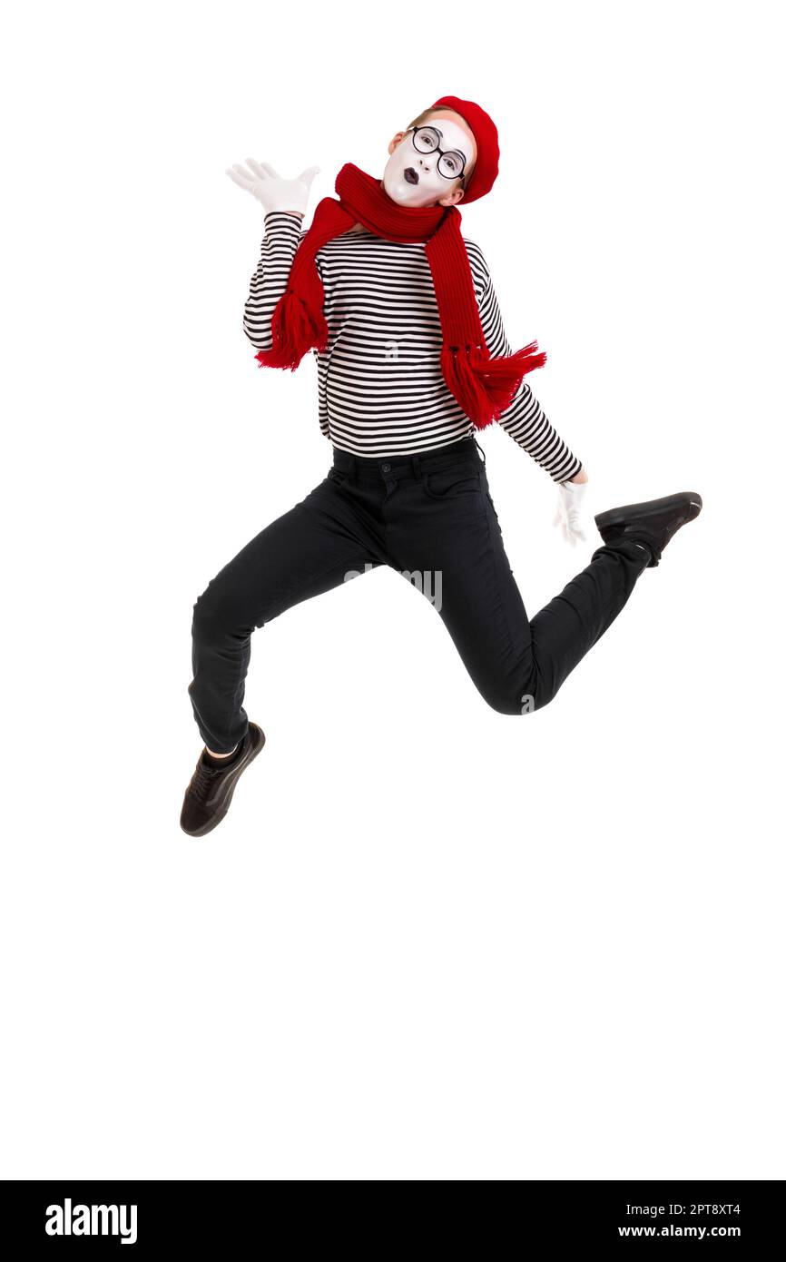 Full length portrait of mime woman artist jumping isolated on white ...