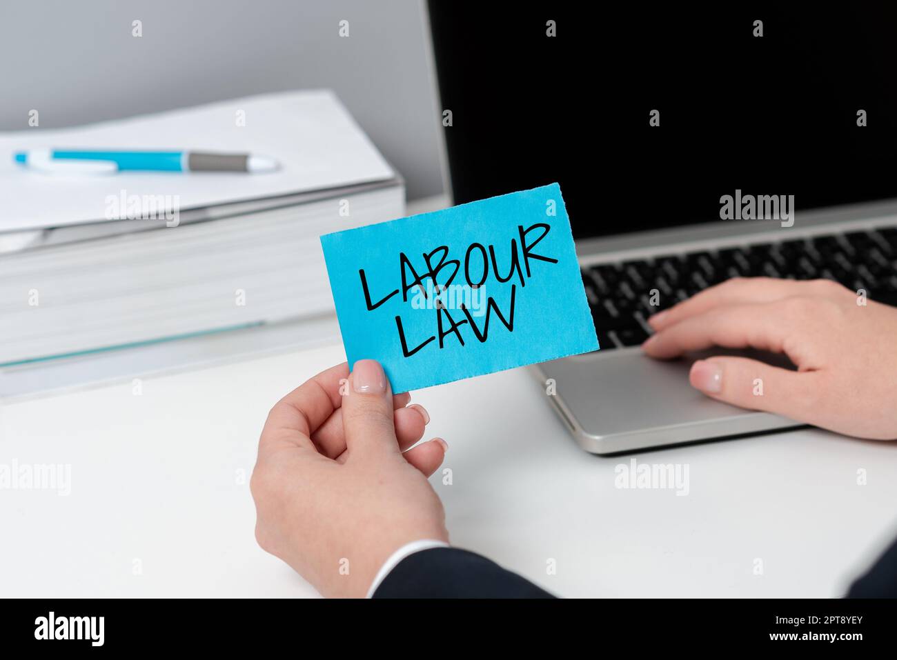 Sign displaying Labour Law, Business overview Rules implemented by the ...