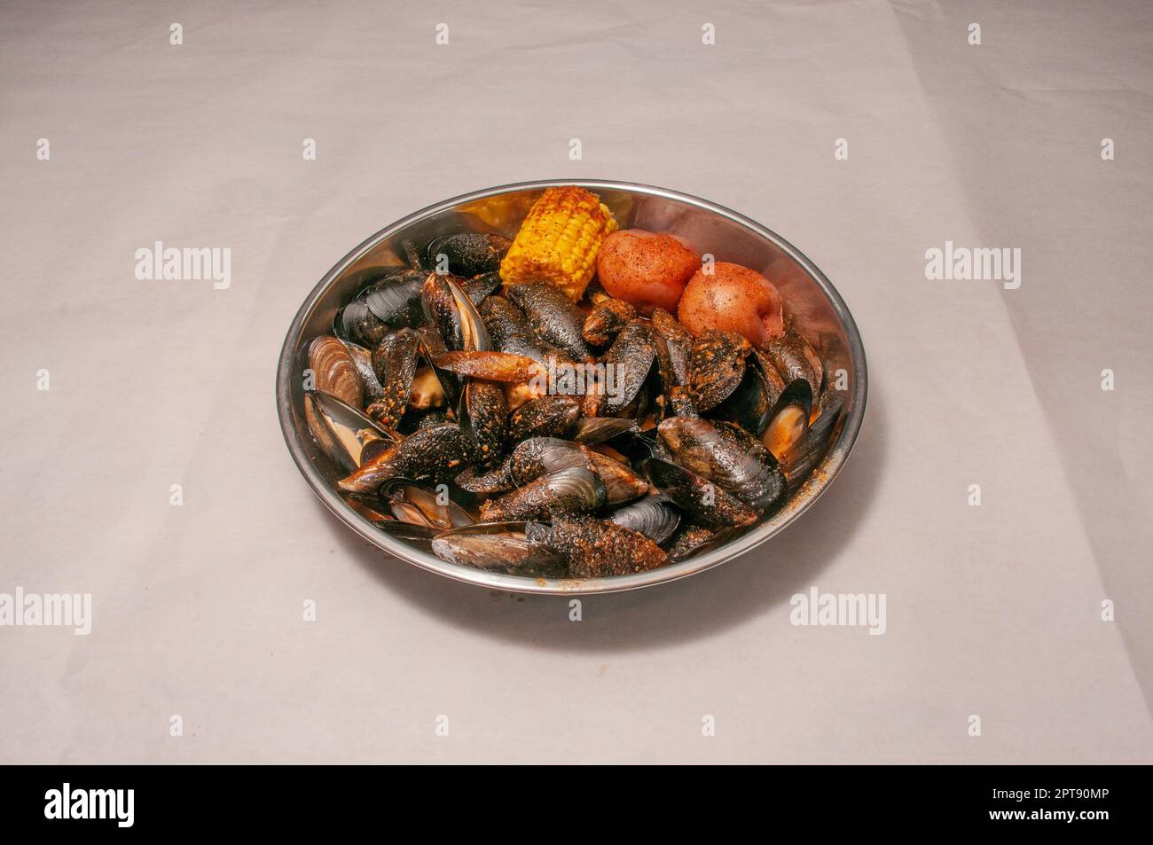 Delectable seafood delicacy known as black mussels Stock Photo - Alamy