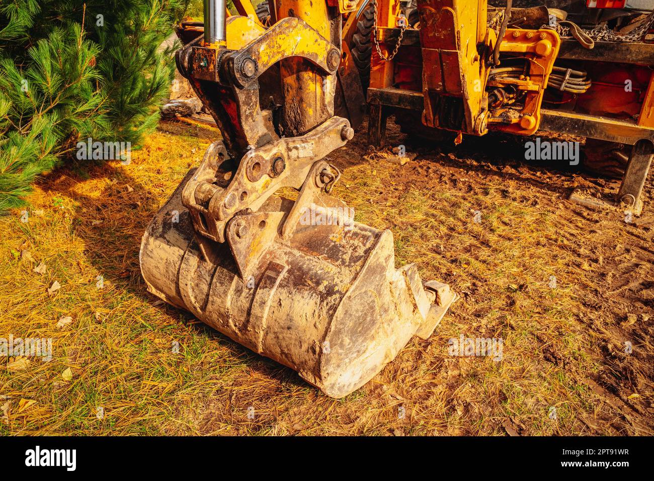 Excavator bucket close-up on the construction site. Heavy earthmoving ...