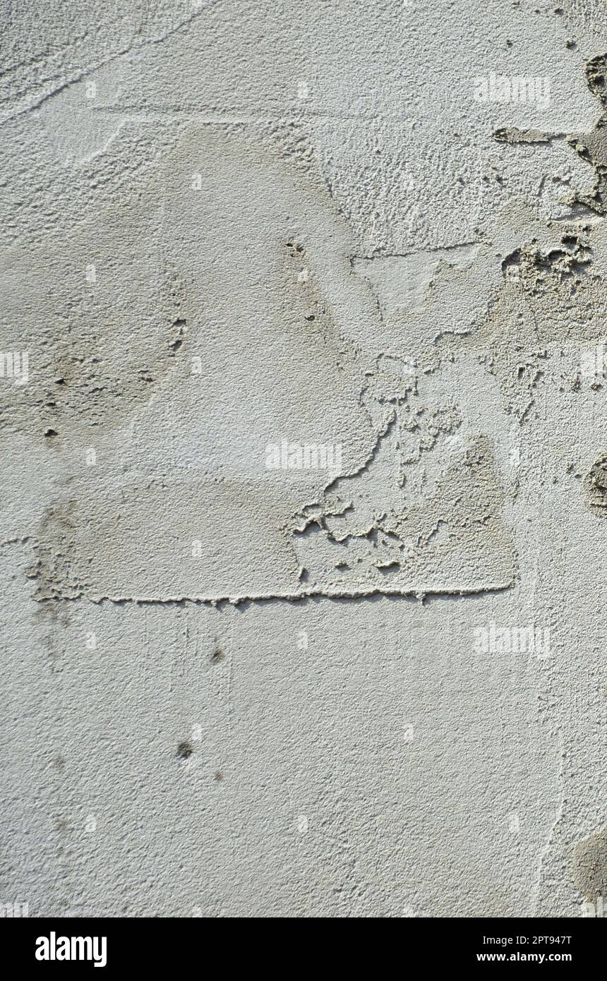 The texture of the wall, covered with gray foam polystyrene plates ...