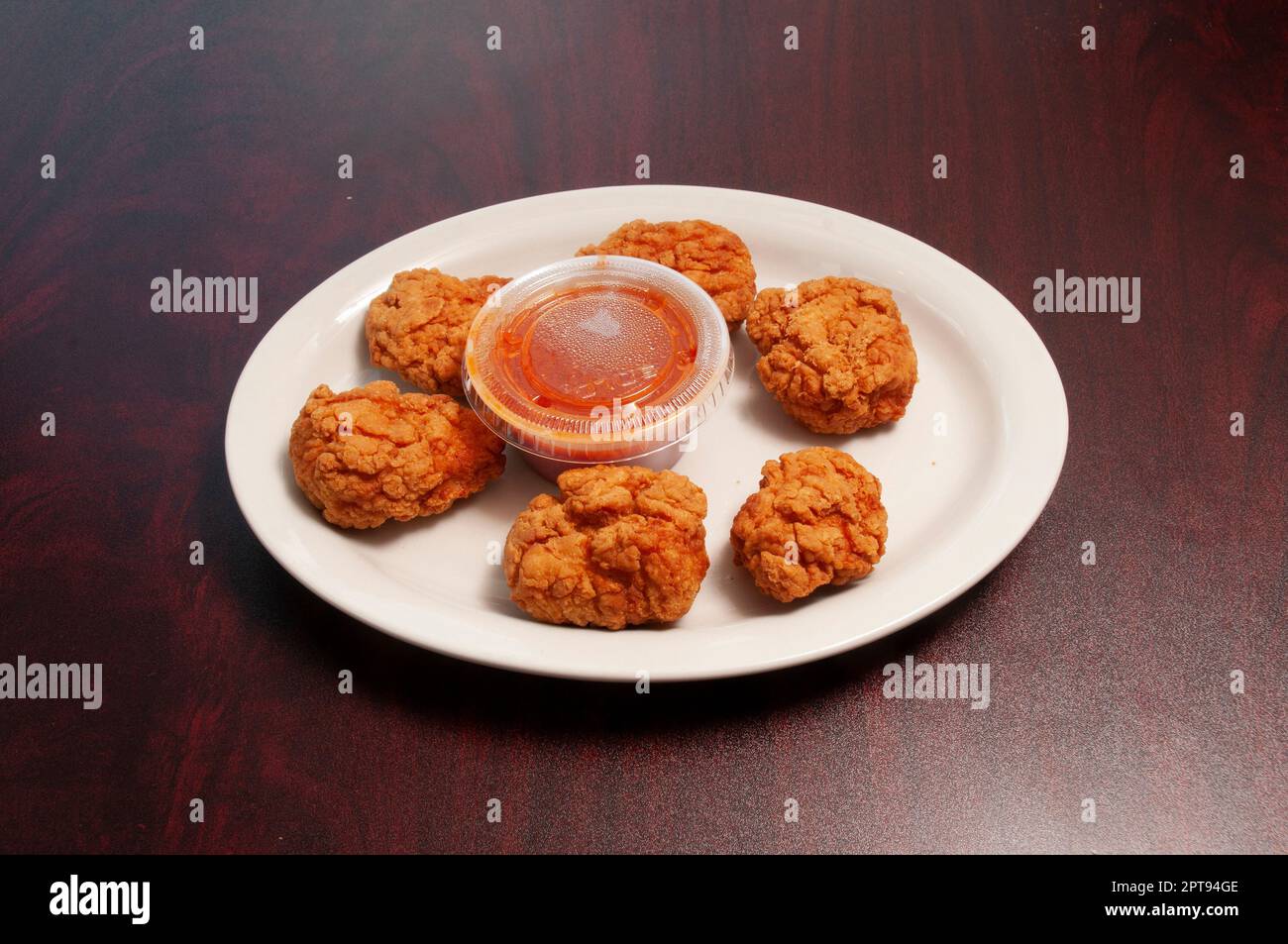 American cuisine dish known as boneless chicken wings Stock Photo - Alamy