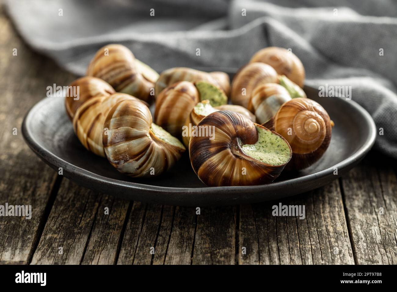 Snails with parsley butter, Bourgogne Escargot Snails on the plate ...