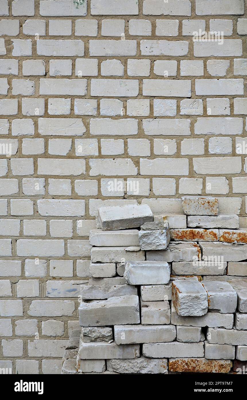 A photo of a set of old bricks that are stacked in a multilayered pile ...
