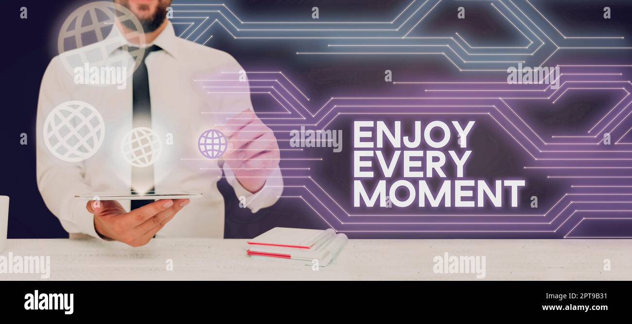 Hand writing sign Enjoy Every Moment, Concept meaning stay positive ...