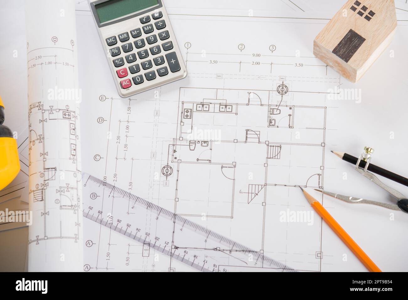 Architectural project workplace. Top view of house plan blueprint paper ...