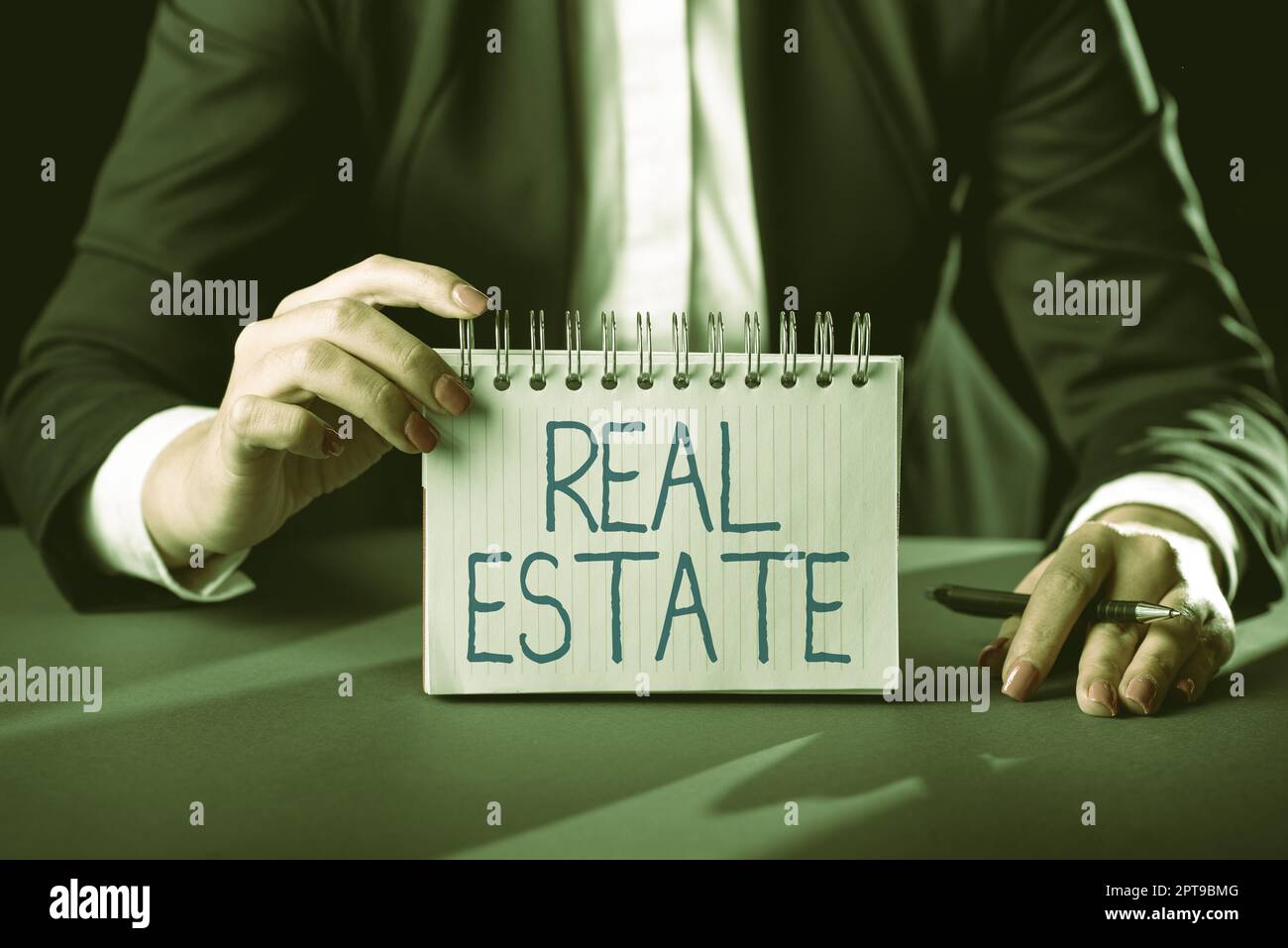 Sign displaying Real Estate, Word Written on total property consisting ...