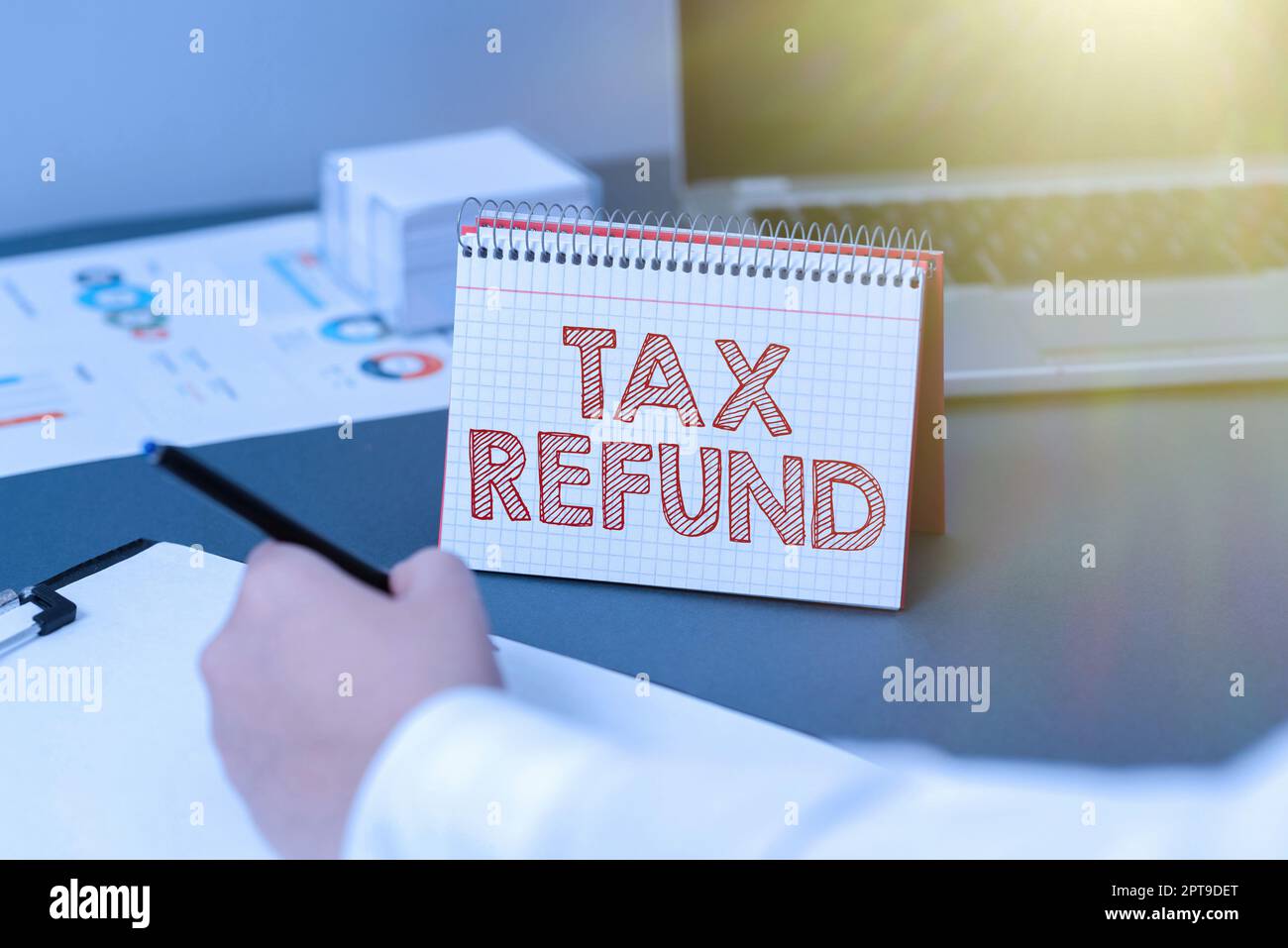 Sign displaying Tax Refund, Word Written on applied when money ...