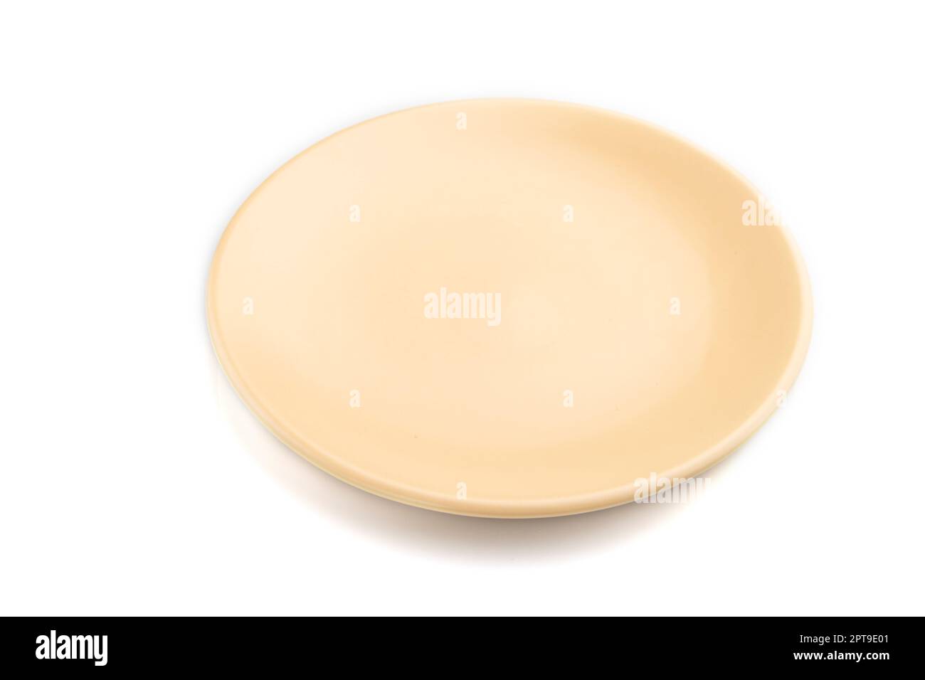 Empty beige ceramic plate isolated on white background. Side view ...